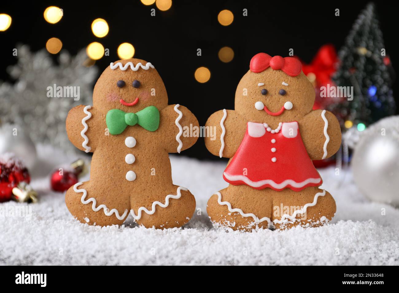 Girl eating gingerbread man hi-res stock photography and images - Alamy