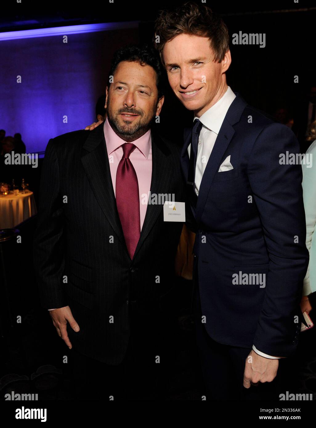 Josh Lieberman, left, and Eddie Redmayne attend the 87th Academy Awards ...