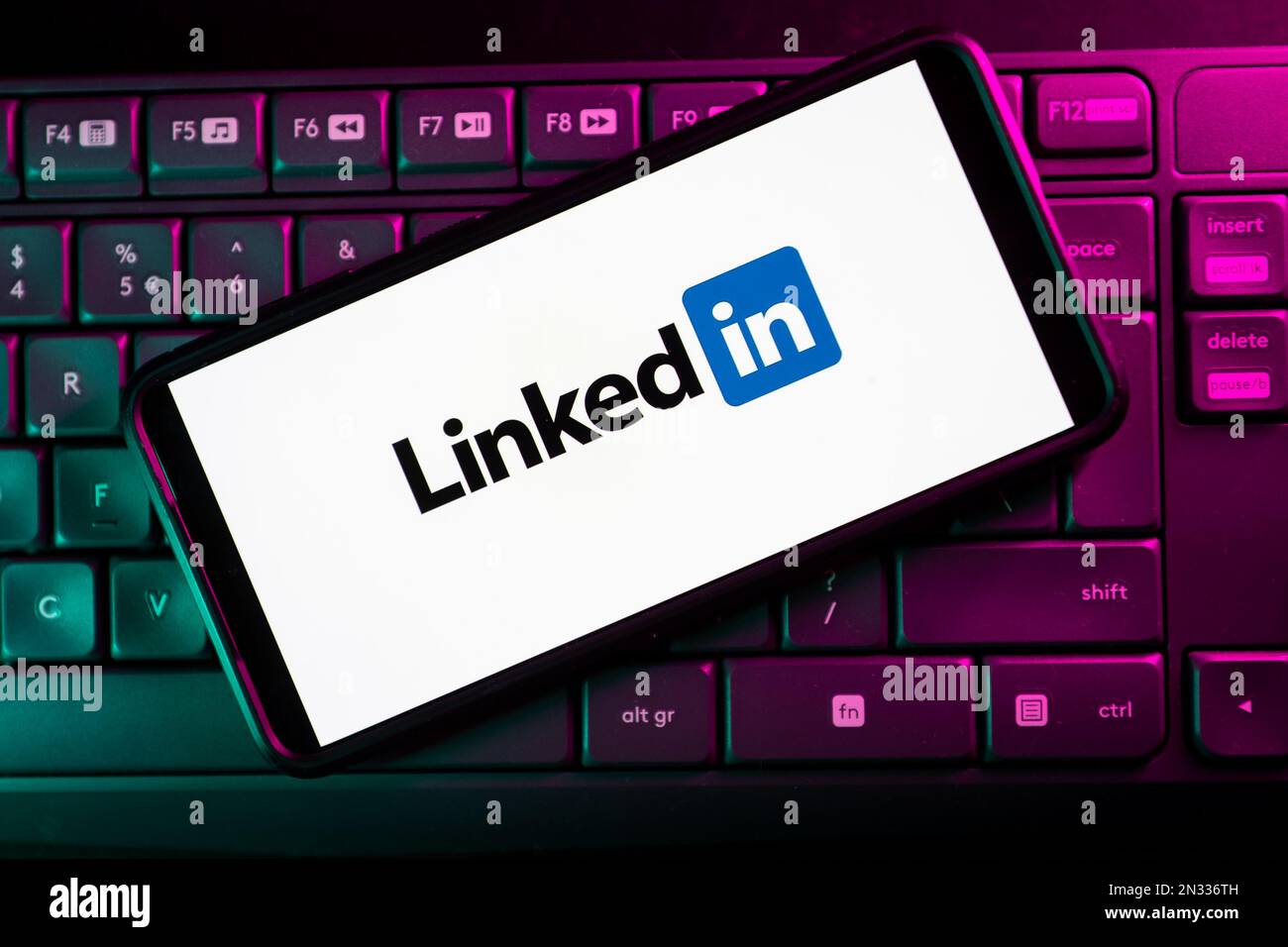 In this photo illustration a LinkedIn logo seen displayed on a ...