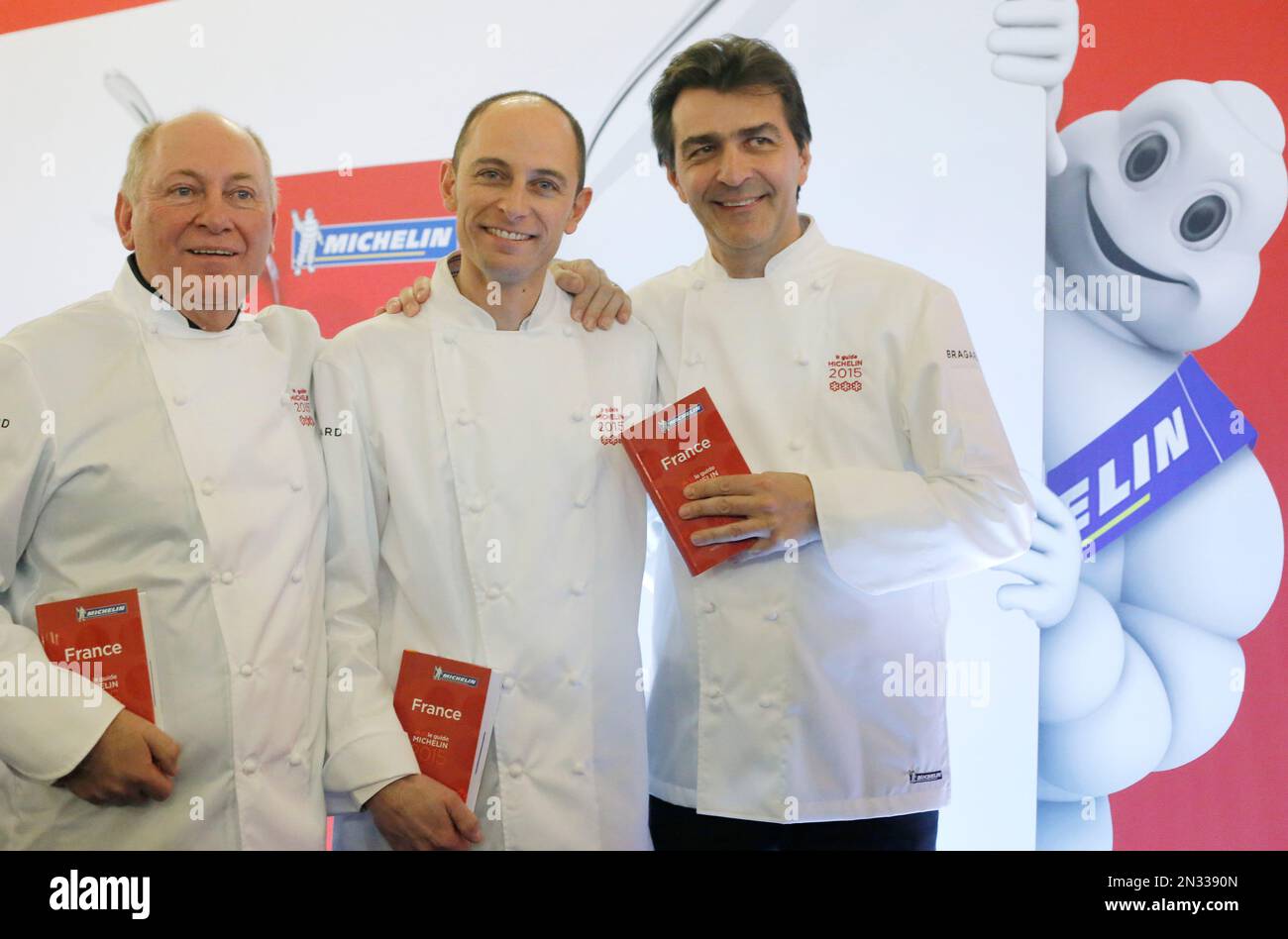French chefs Rene, left, and his son Maxime Meilleur, center, who run ...