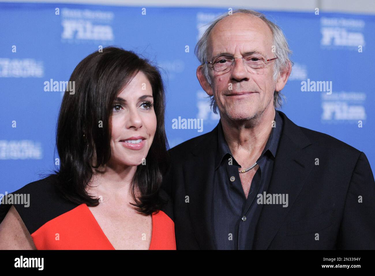Christopher Lloyd, right, and Lisa Loiacono arrive at the 30th Santa ...