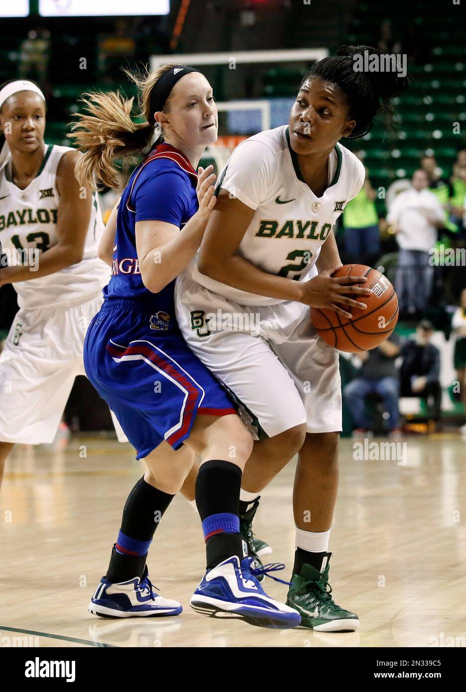 Kansas guard Lauren Aldridge, left, defends as Baylor's Niya Johnson (2 ...