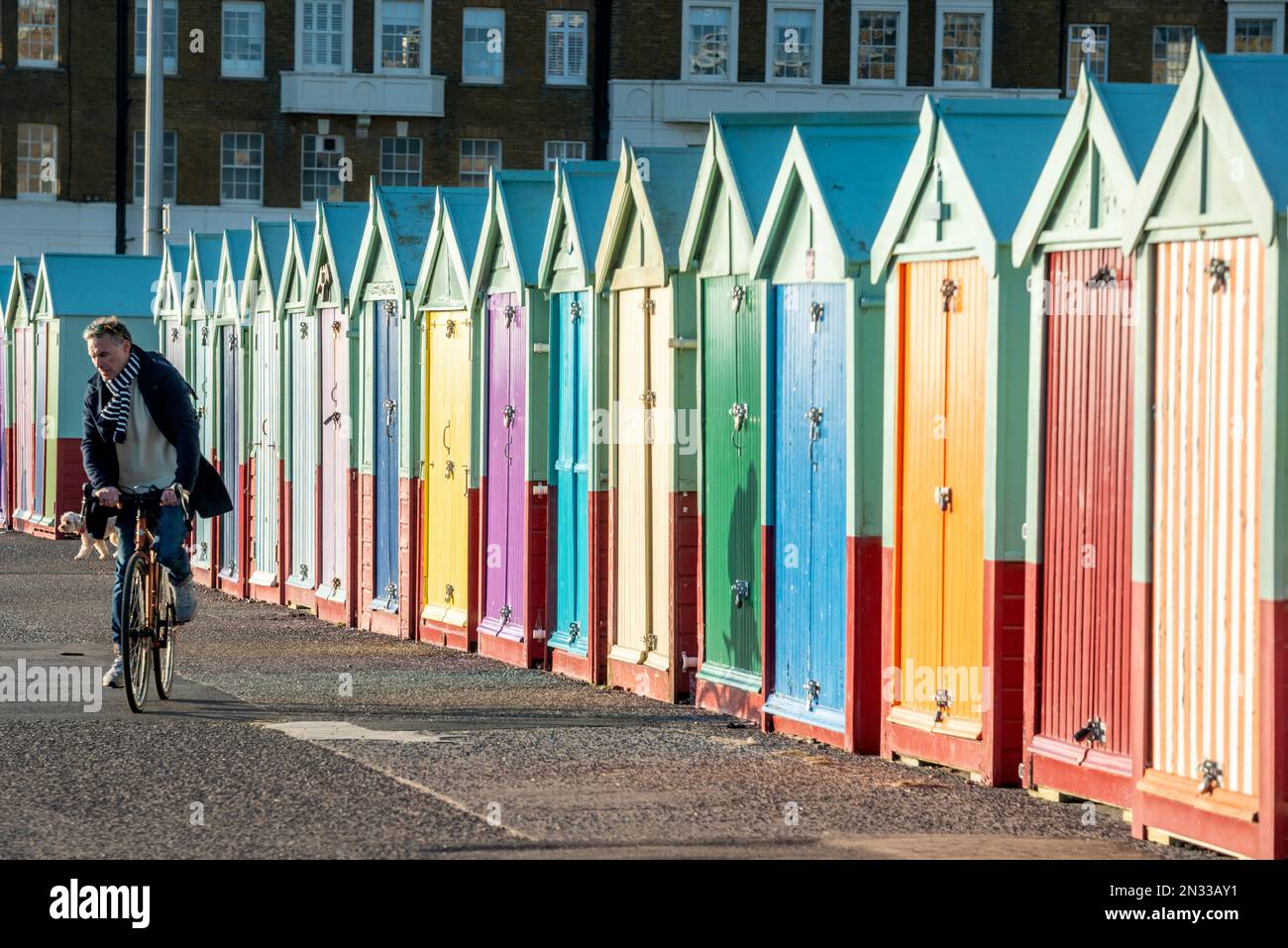 Brighton, February 7th 2023: Enjoying the late afternoon winter sun by ...