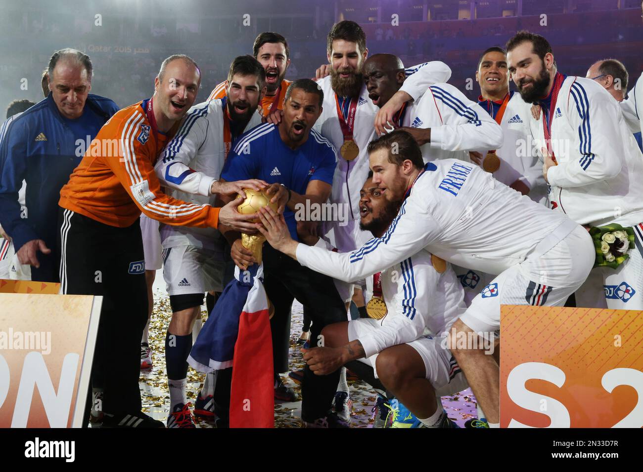 French players celebrate with the trophy during the podium ceremony of ...