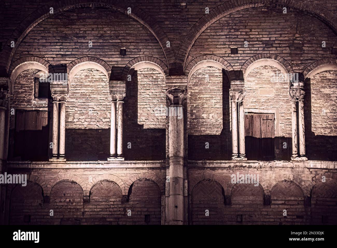 A photo showcasing the architectural details of buildings in Ferrara's ...