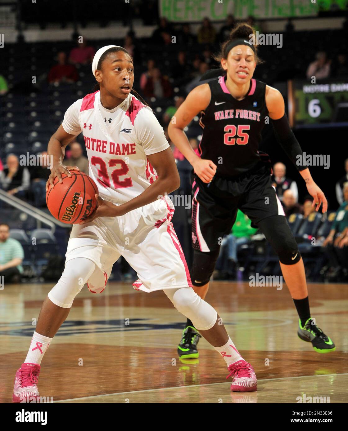 Notre Dame guard Jewell Loyd, left, throws a pass around Wake Forest ...
