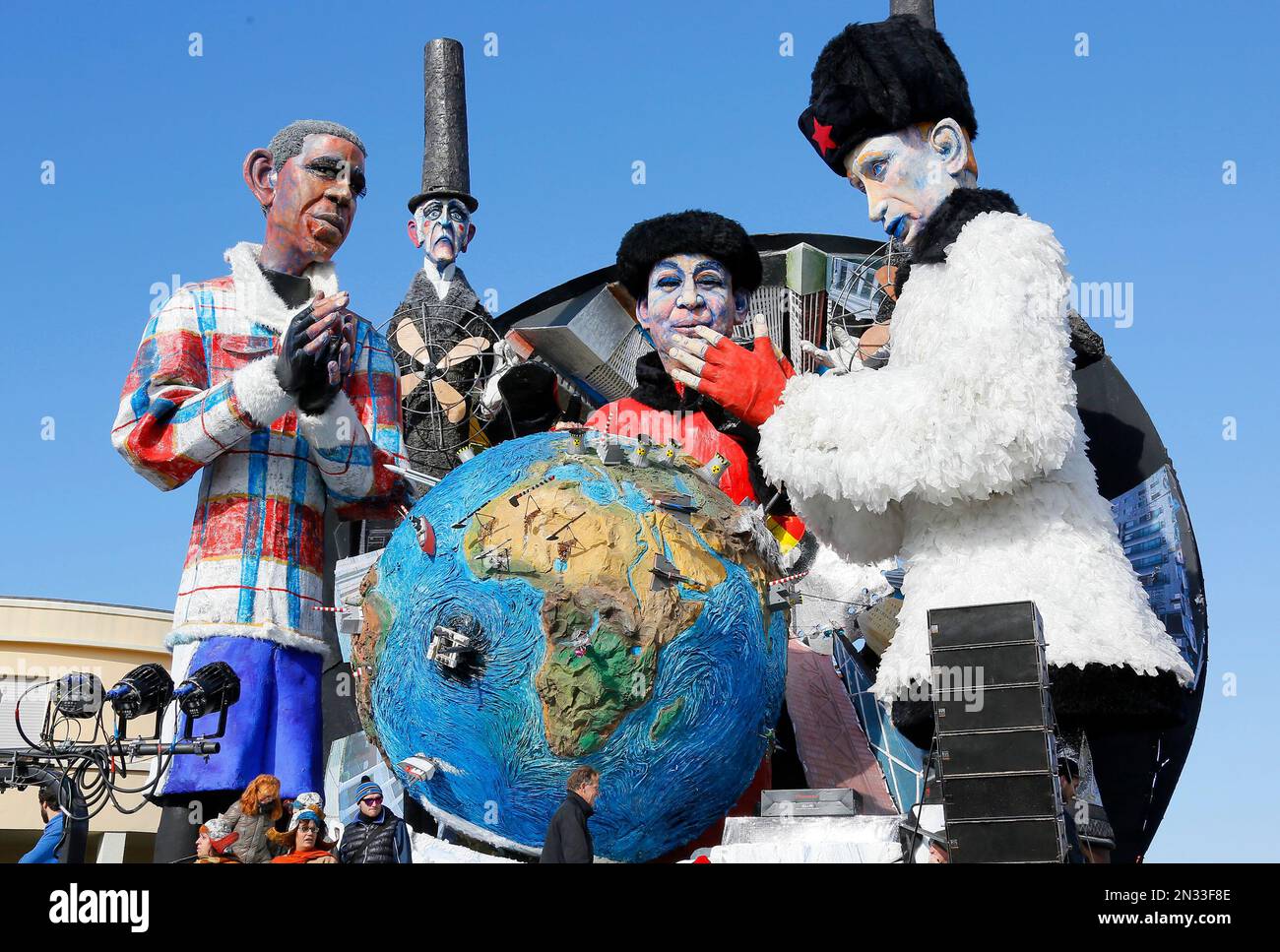 A float depicting United States President Barack Obama, left, Chinese ...