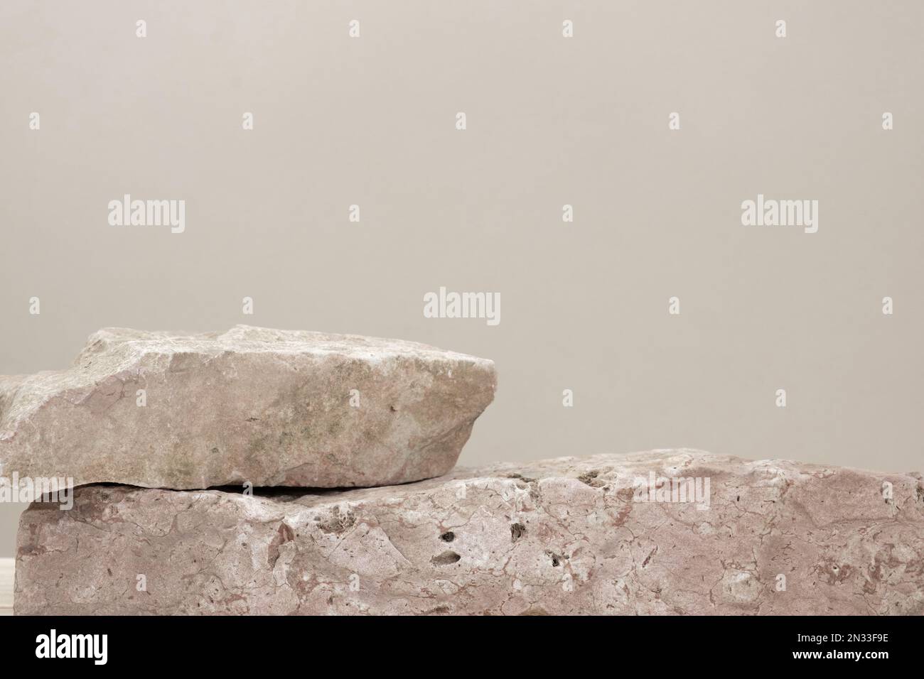 Stone Podium for promotion on beige Background. Natural pedestal. Two ...