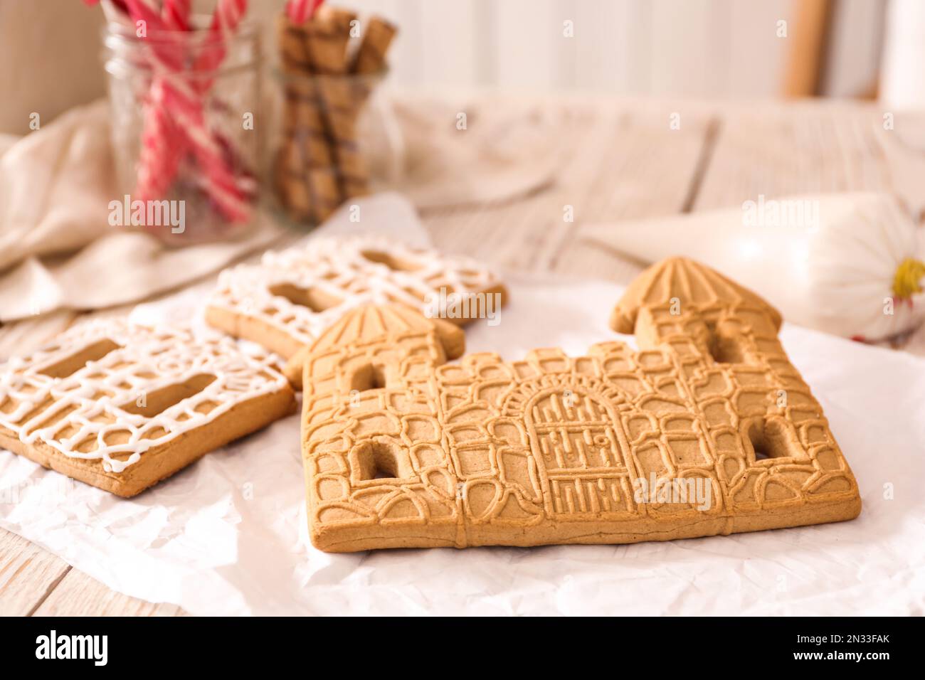 Parts of gingerbread house on table, closeup Stock Photo - Alamy
