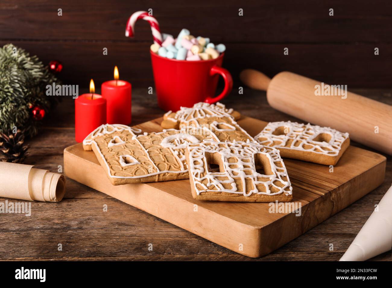 Parts of gingerbread house on wooden table Stock Photo - Alamy