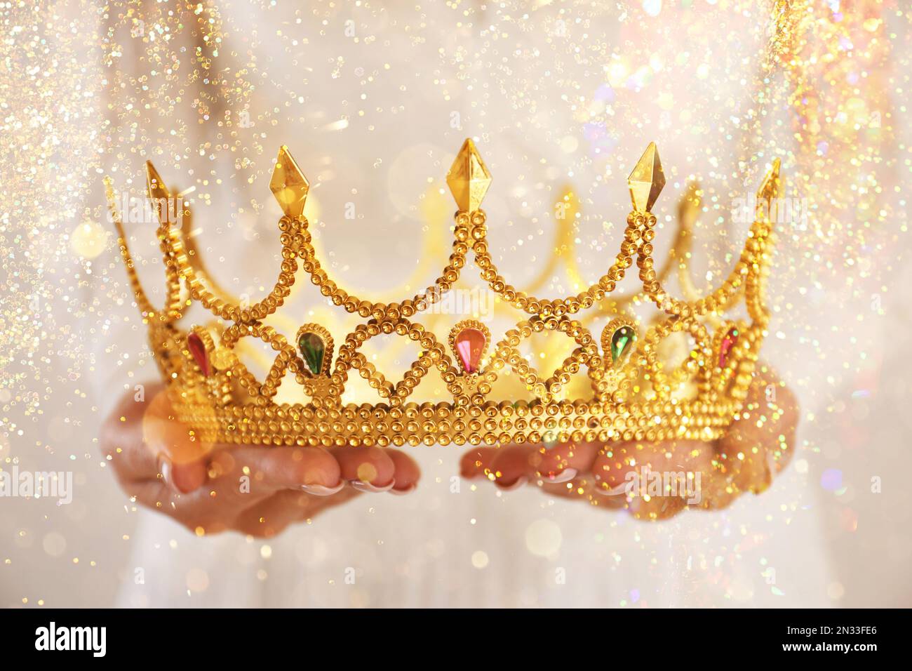 Fantasy world. Woman holding beautiful golden crown, closeup Stock ...