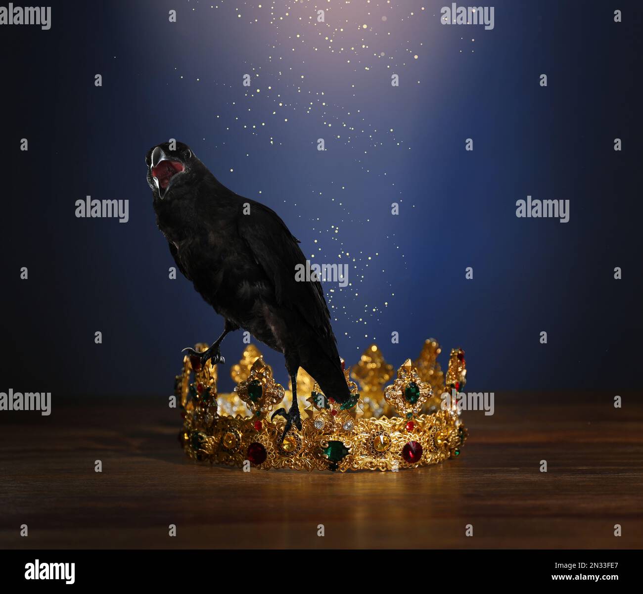 Fantasy world. Black crow lit by magic light sitting on golden crown ...