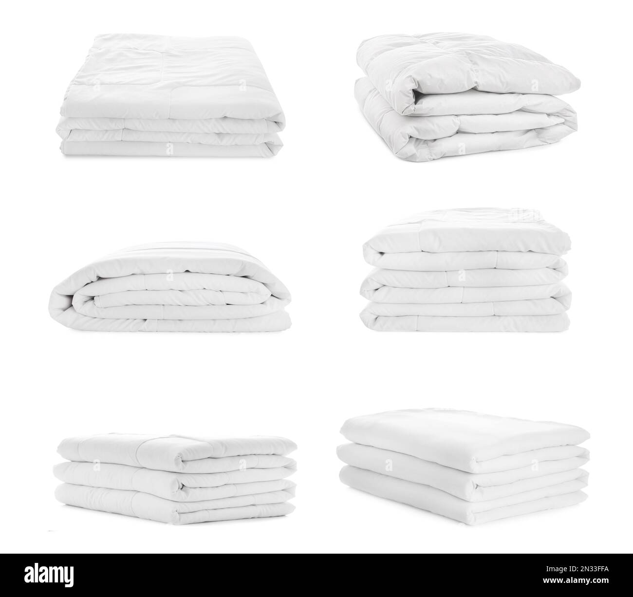 Set of folded blankets isolated on white Stock Photo - Alamy
