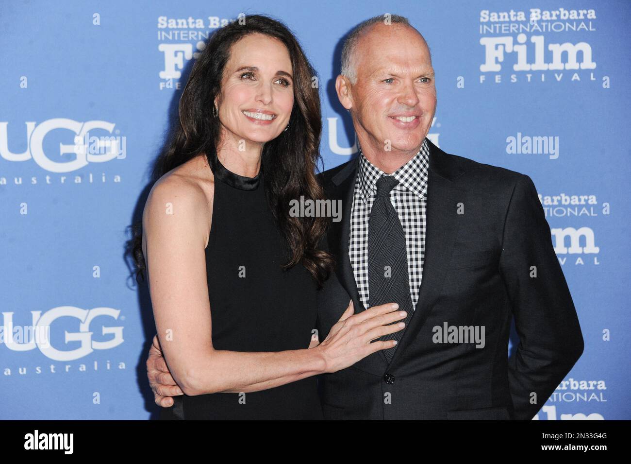 Andie MacDowell, left, and Michael Keaton arrive at the 30th Santa ...