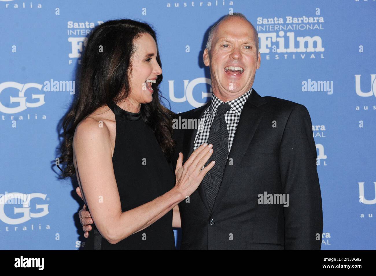 Andie MacDowell, left, and Michael Keaton arrive at the 30th Santa ...