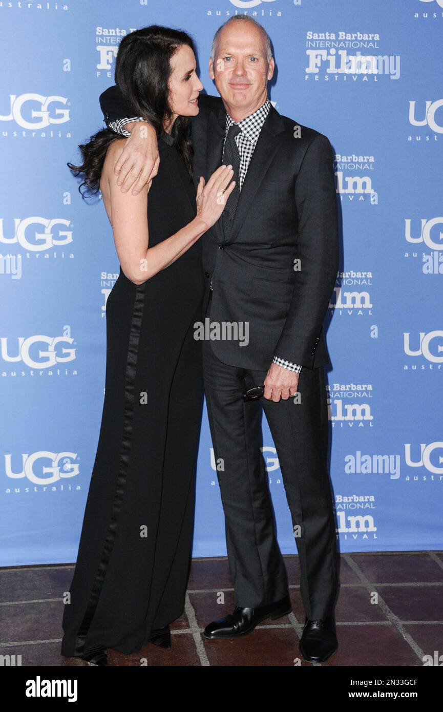 Andie MacDowell, left, and Michael Keaton arrive at the 30th Santa ...
