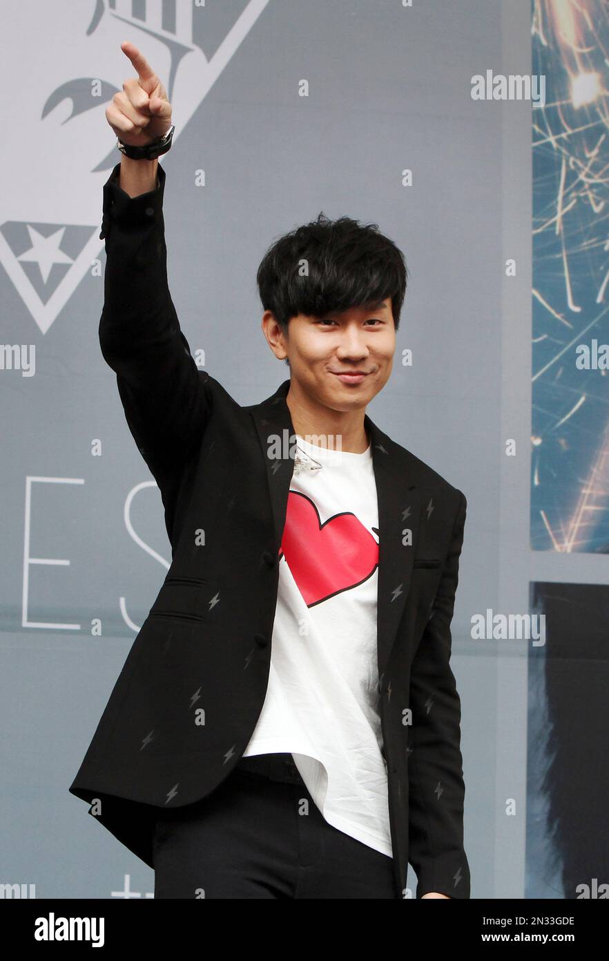 Singapore pop singer JJ Lin waves to fans during an event to promote ...