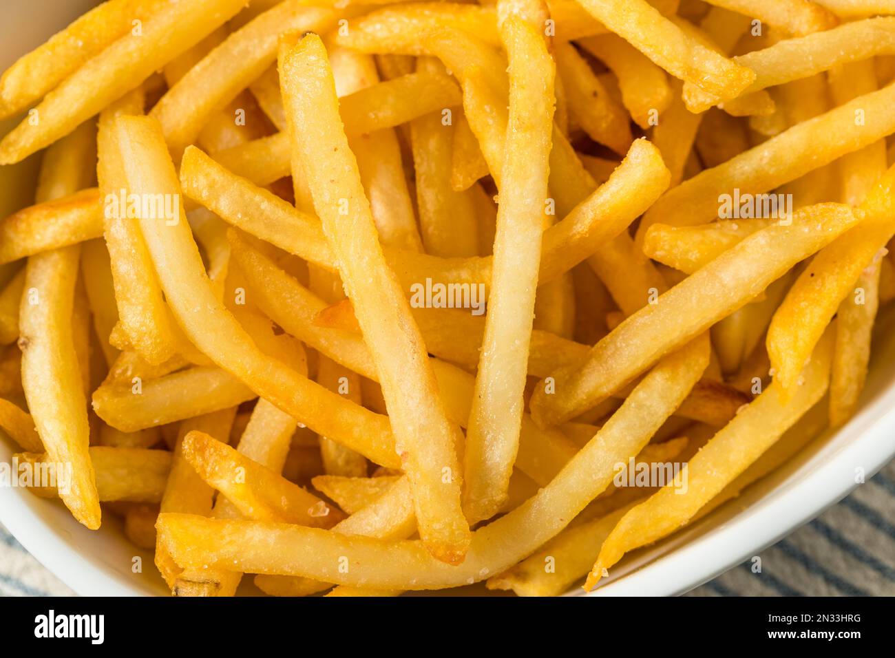 Golden salt fries hi-res stock photography and images - Alamy
