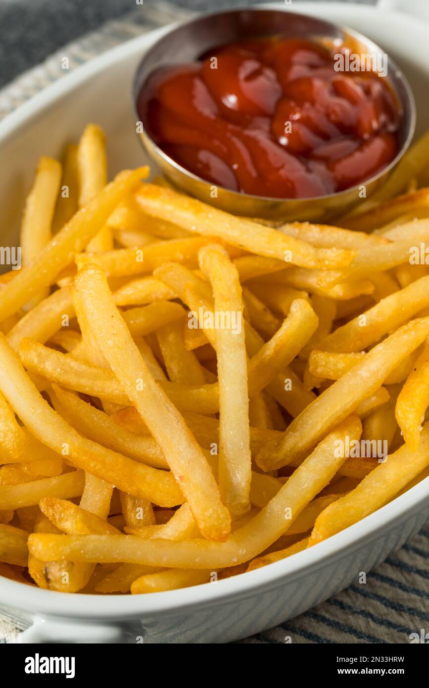Homemade Golden French Fries with Tomato Ketchup and Salt Stock Photo ...