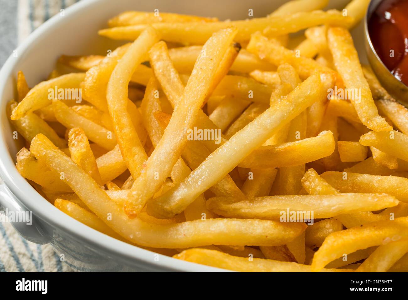 Homemade Golden French Fries with Tomato Ketchup and Salt Stock Photo ...