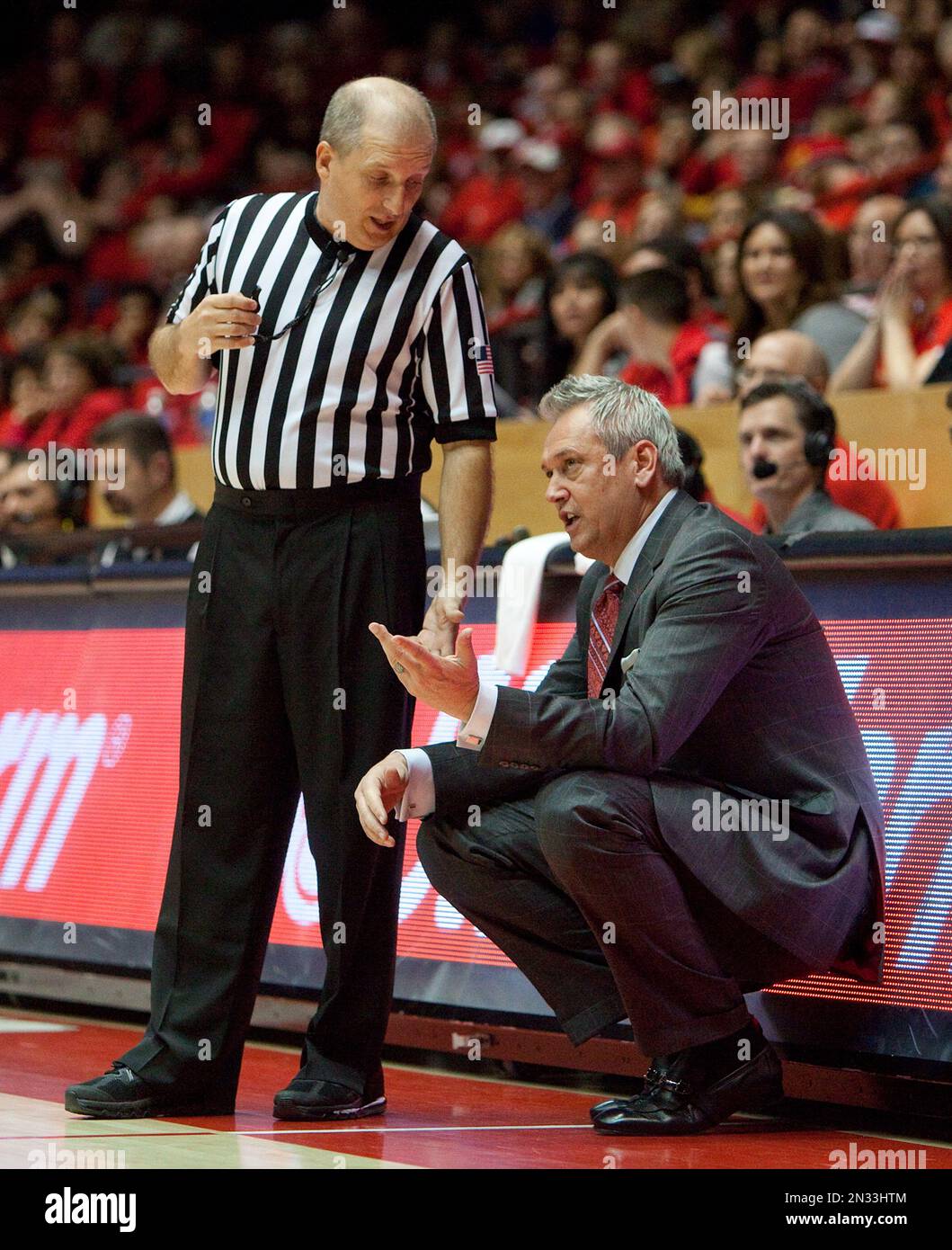 New Mexico coach Craig Neal questions an official during the second ...