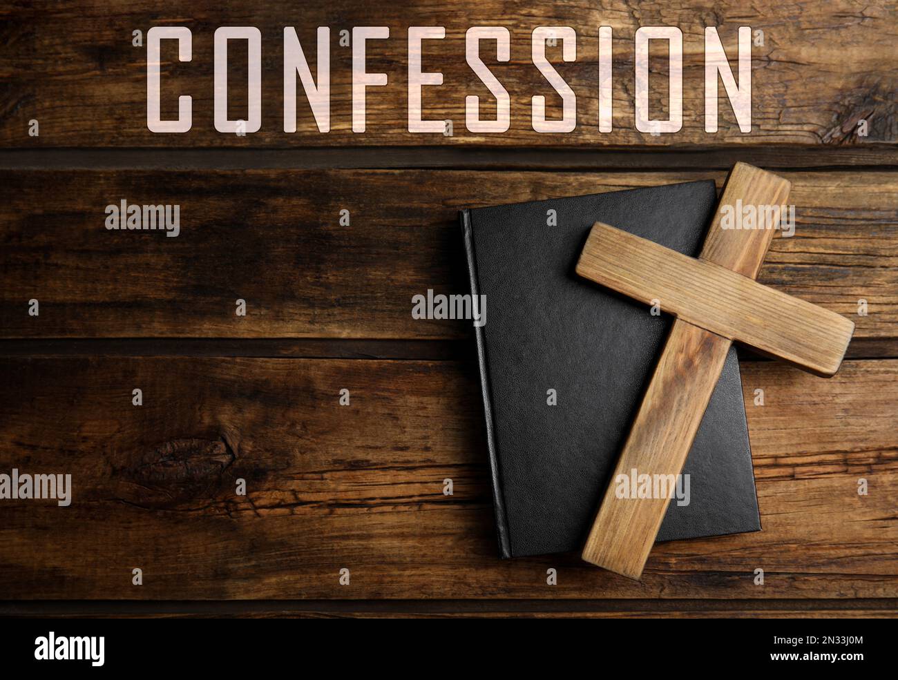 Christian cross, Bible and word Confession on wooden background, top ...