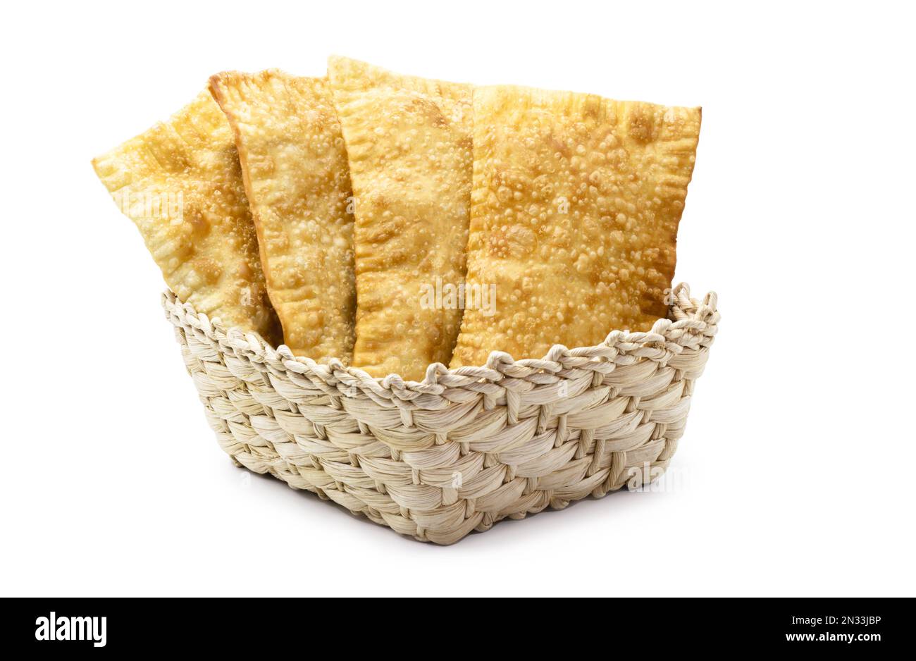 Brazilian pastry, typical fried salty stuffed with ground beef, sauce ...