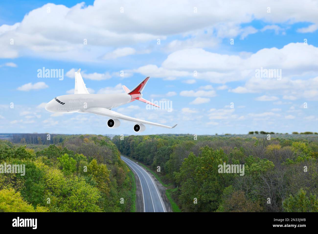 Airplane flying over forest hi-res stock photography and images - Alamy