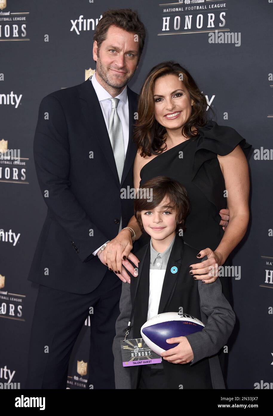 From left, Peter Hermann, Mariska Hargitay and August Hermann arrive at ...