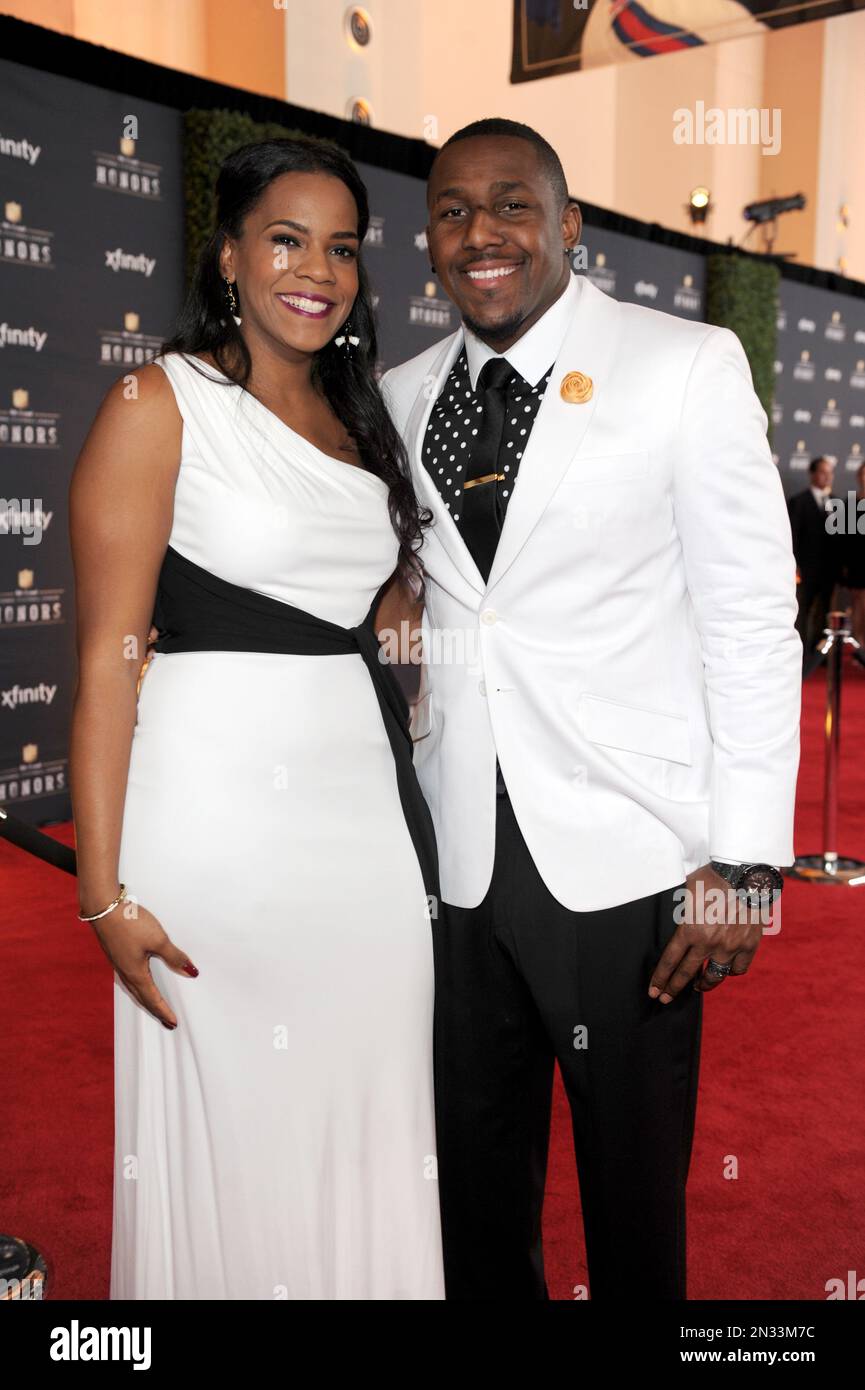 Kelly Davis, left, and Thomas Davis, of the Carolina Panthers, arrives ...