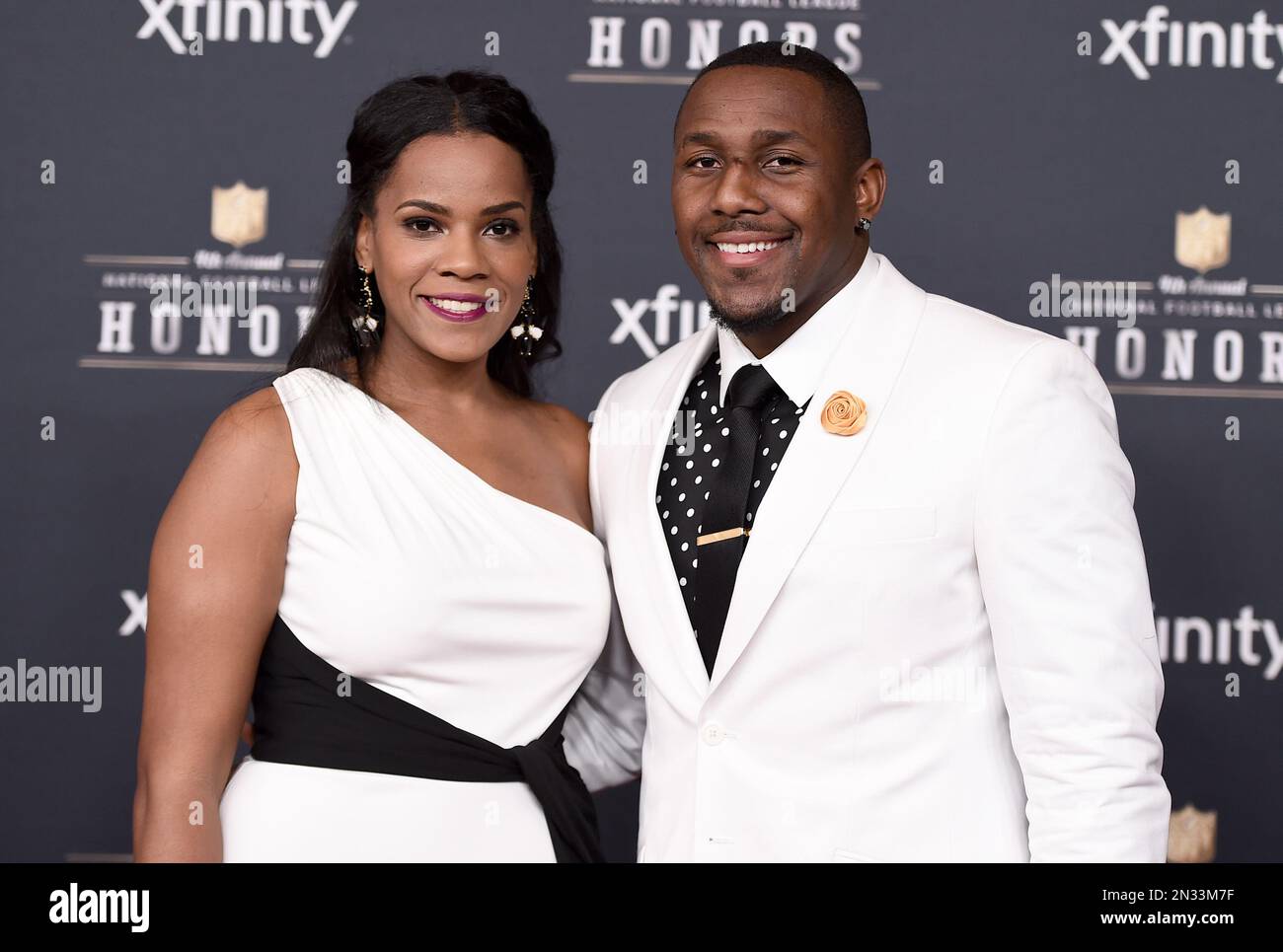 Kelly Davis, left, and Thomas Davis, of the Carolina Panthers, arrive ...