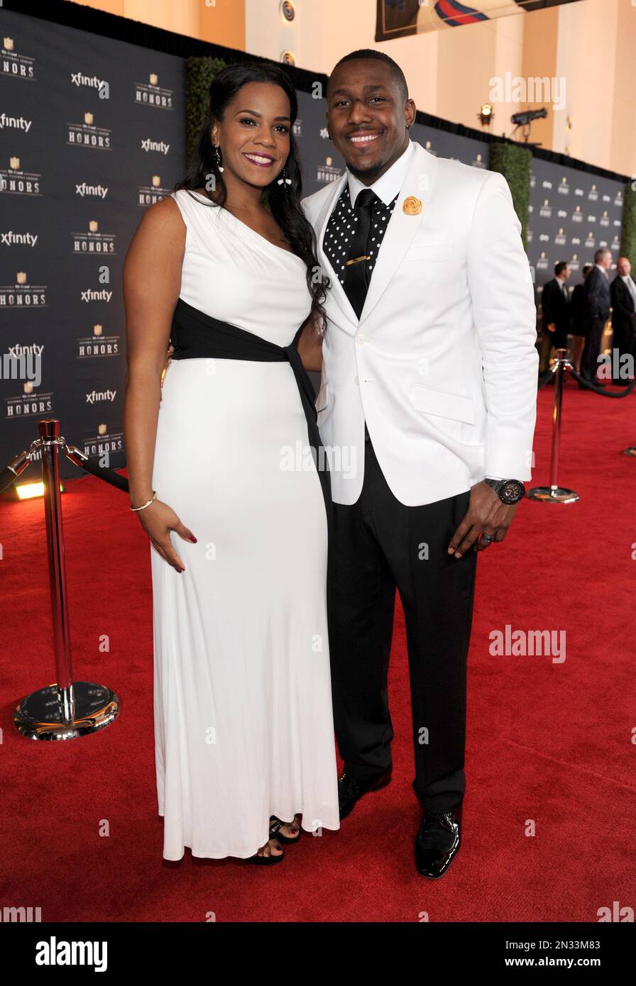 Kelly Davis, left, and Thomas Davis, of the Carolina Panthers, arrives ...