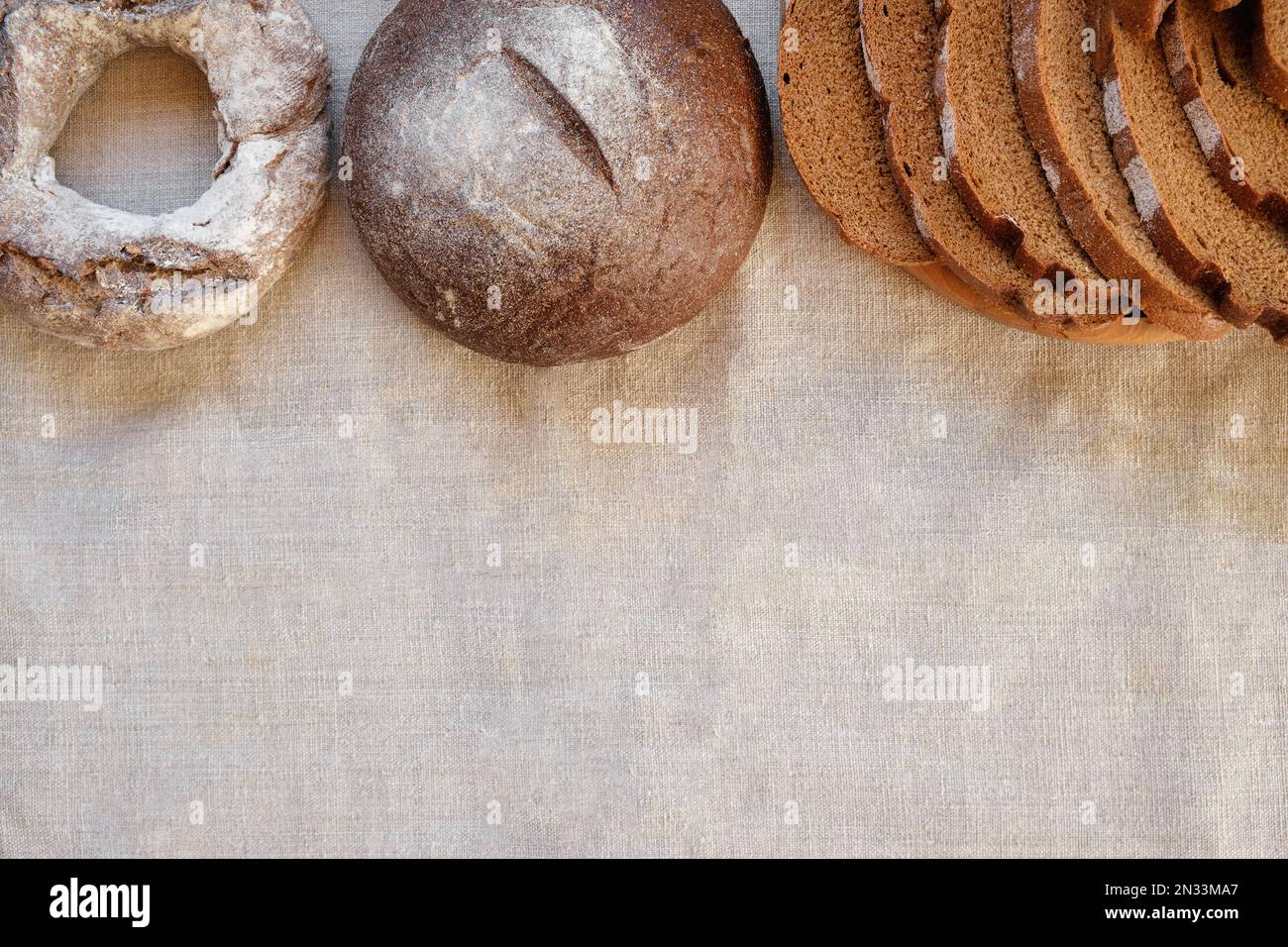 Baked bread. Loaf of Bread. Fresh Bakery Products on Wooden Board ...