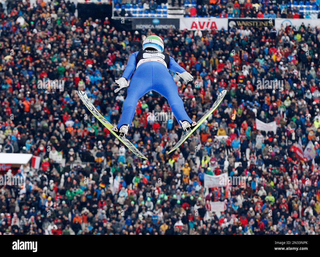 Norway's Rune Velta soars through the air during the ski jumping team ...