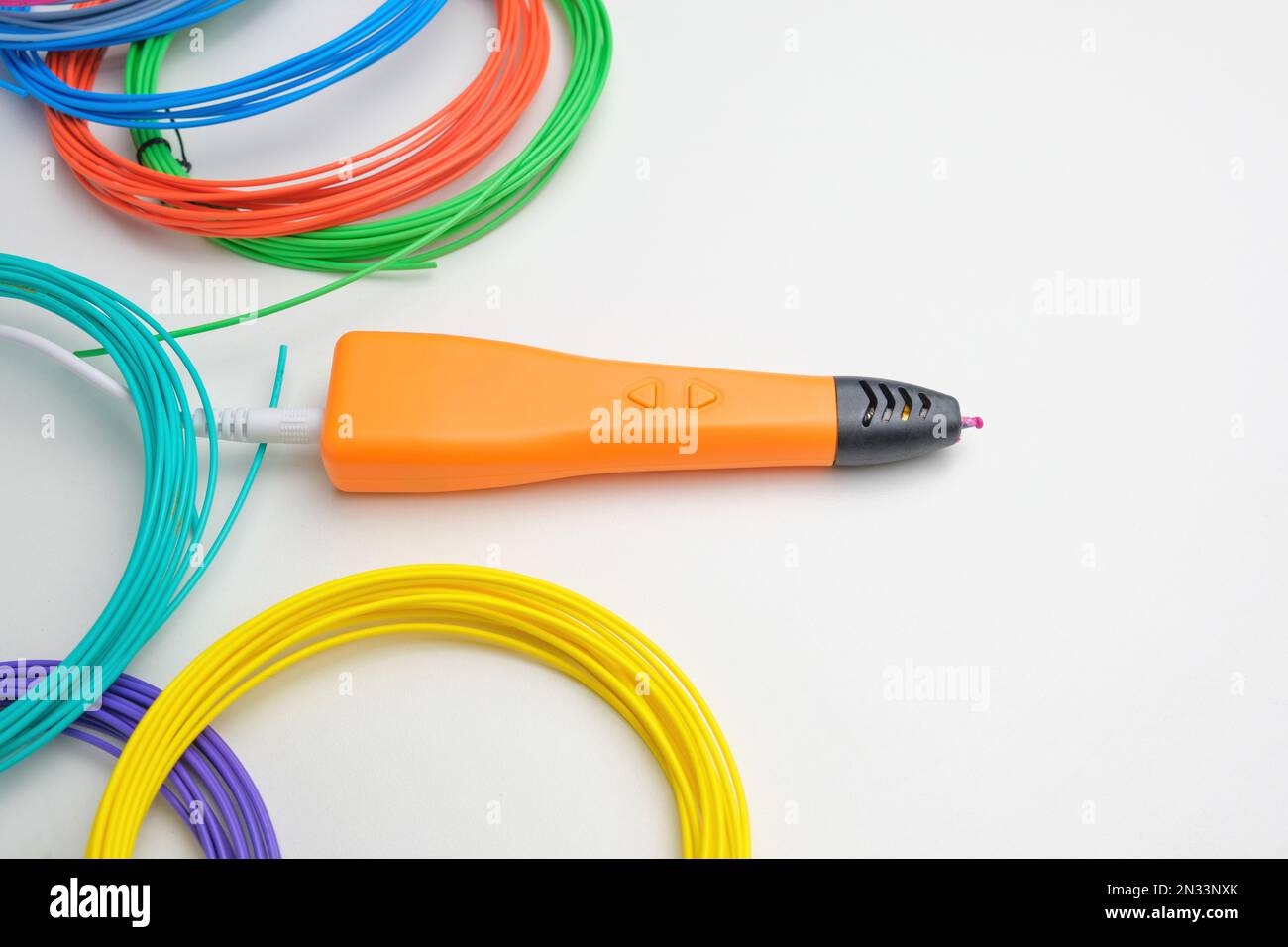 3d Pen. Printing with Colored Plastic Wire Filament. Child making a ...