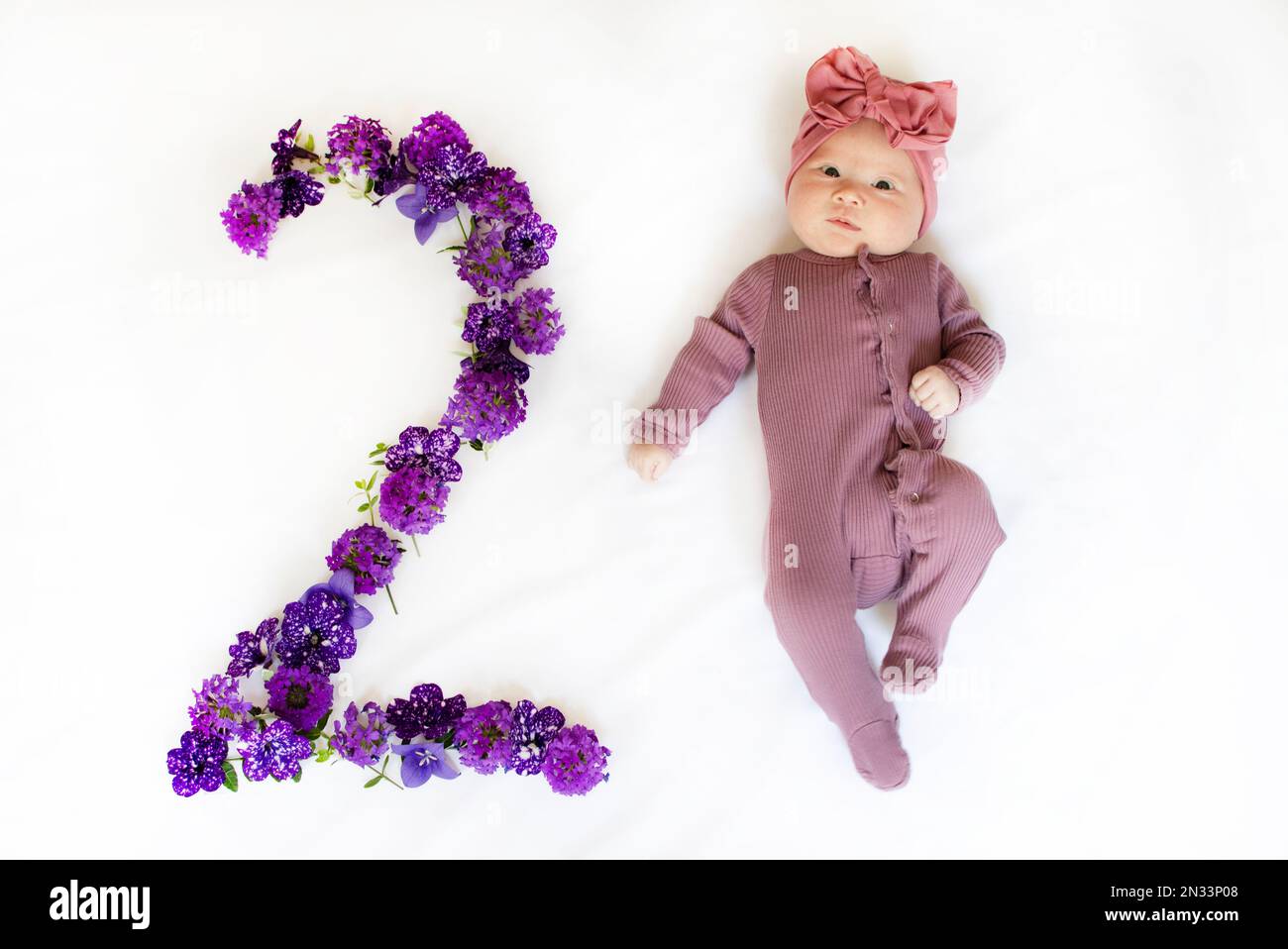 2-month-old baby girl. Baby milestone two months. Two month old baby ...