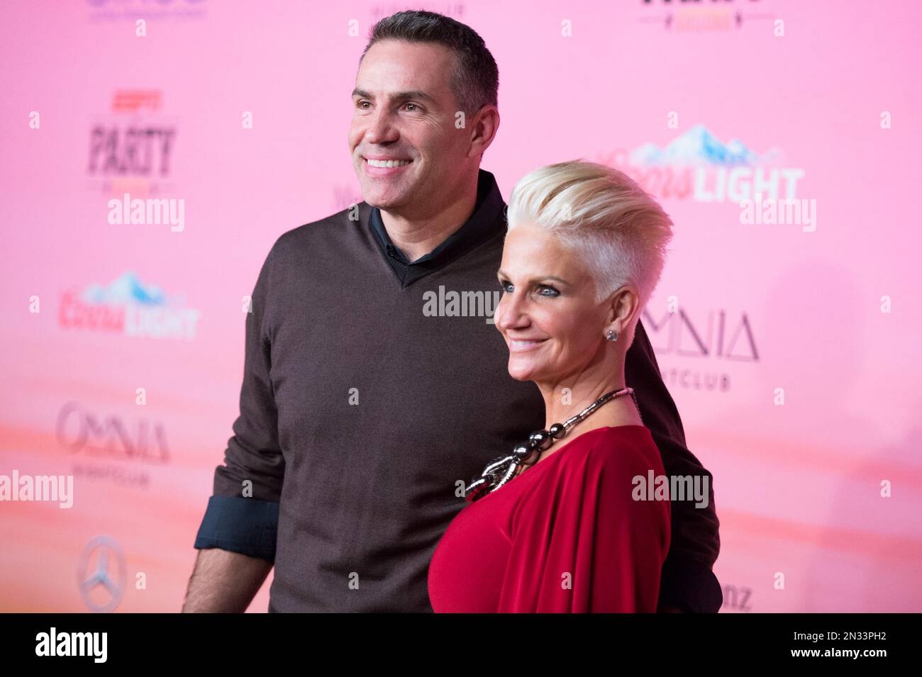 Kurt Warner, left, and Brenda Warner arrive at the ESPN Super Bowl XLIX ...