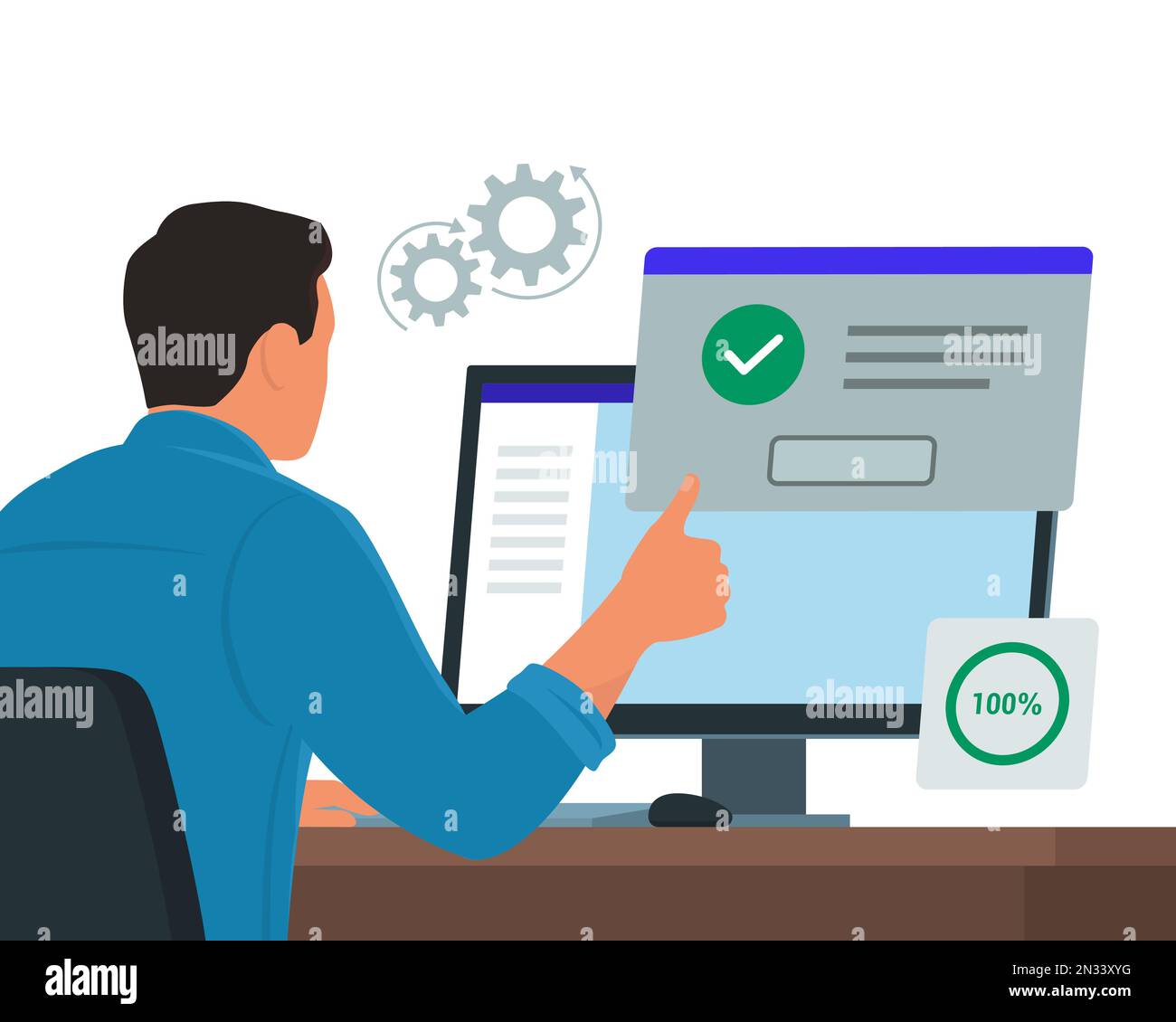 Man sitting at desk using a computer and giving a thumbs up, he ...