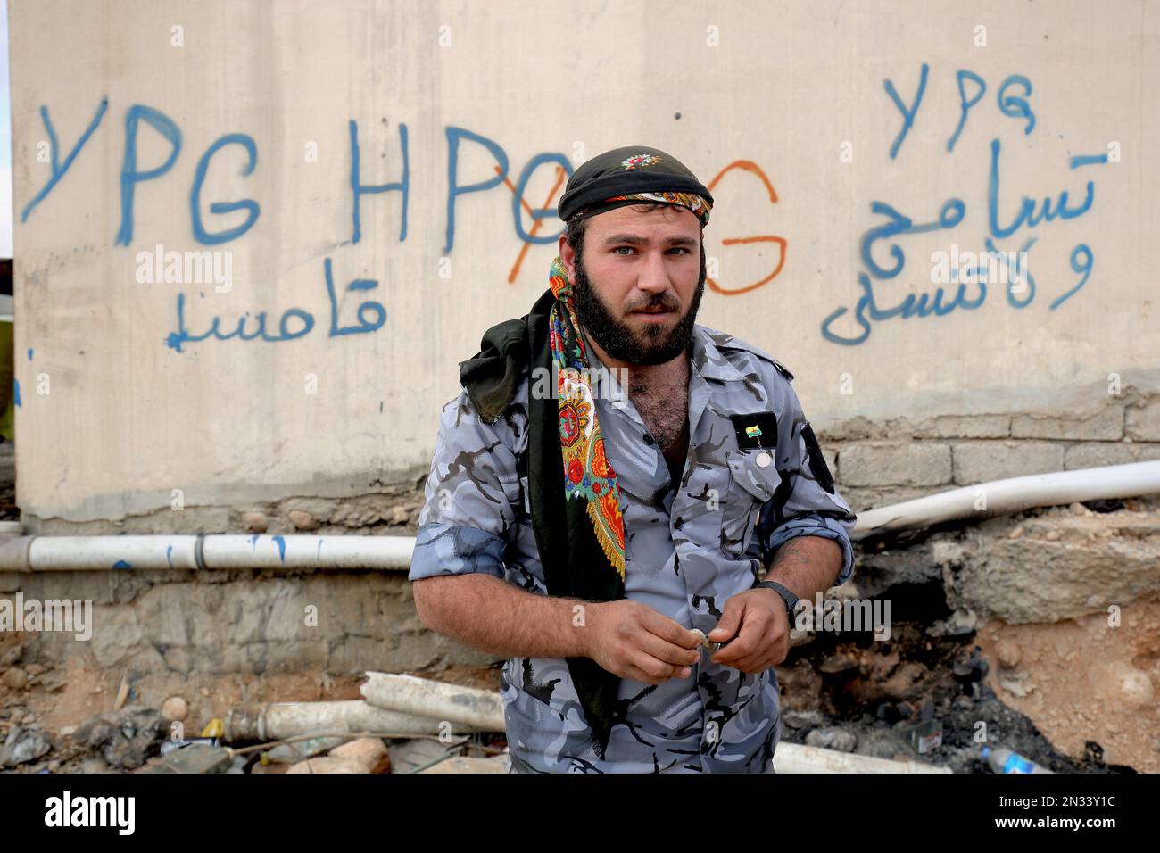 In this Thursday Jan. 29, 2015 photo, a Syrian fighter from the Syria ...