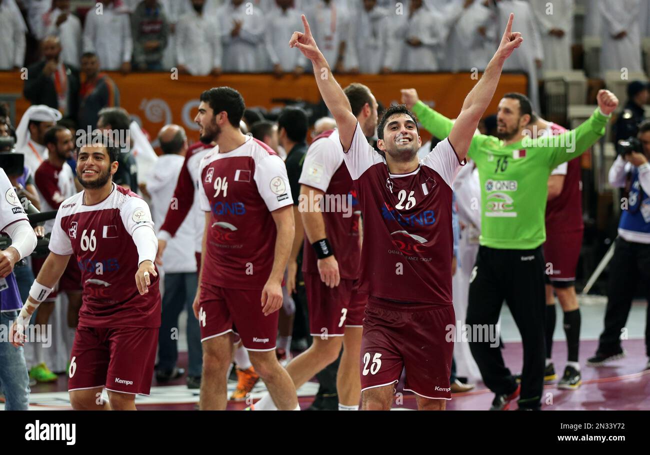 Players from Qatar celebrate their win following the 24th Men's ...