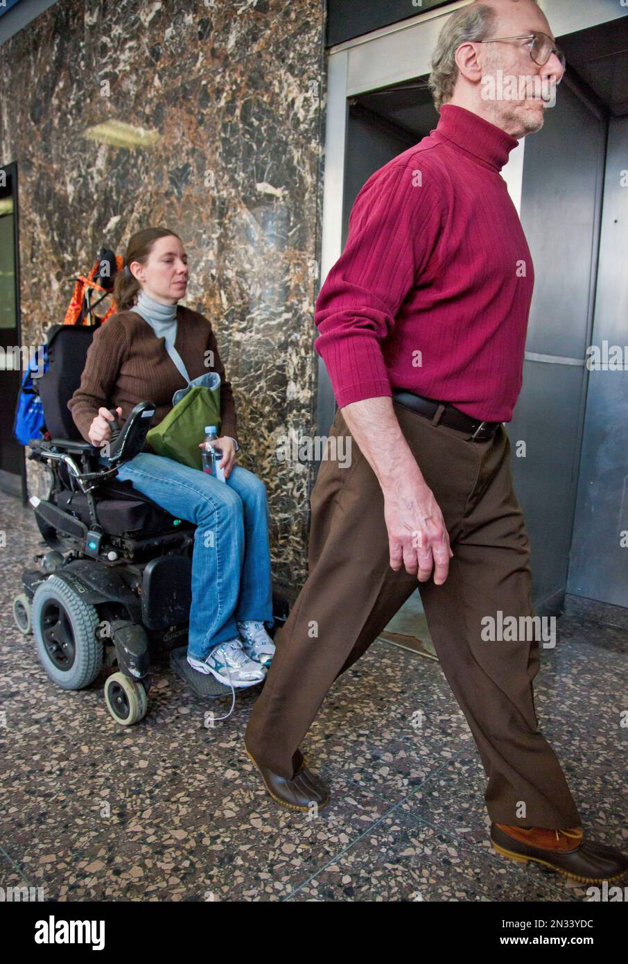 Stanley Patz, right, the father of Etan Patz, leads his wheelchair ...