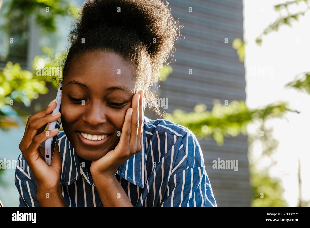 Portrait of young beautiful smiling african woman with closed eyes ...