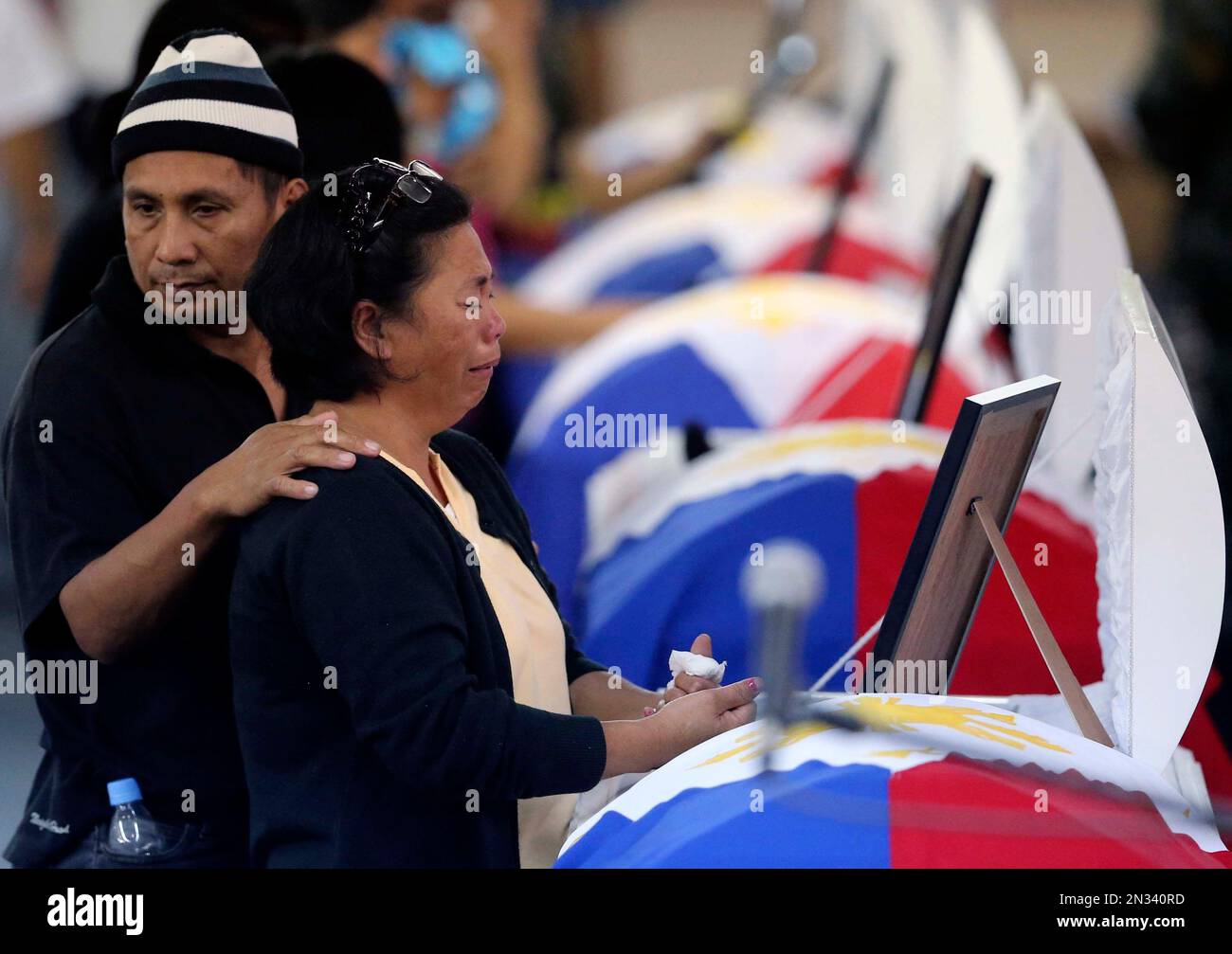 Relatives of the 44 elite police commandos killed last Sunday, during ...