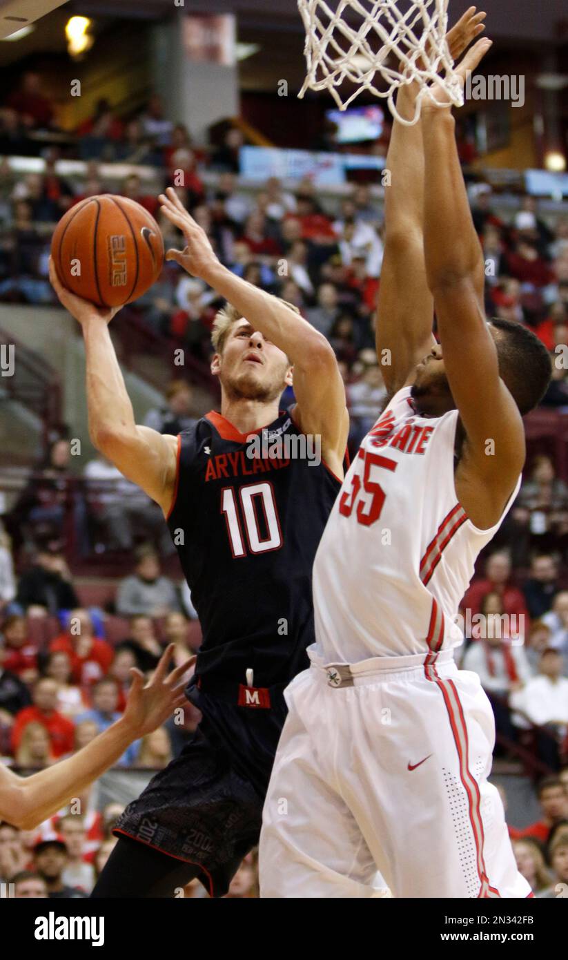 Maryland's Jake Layman shoots against Ohio State's Trey McDonald during ...