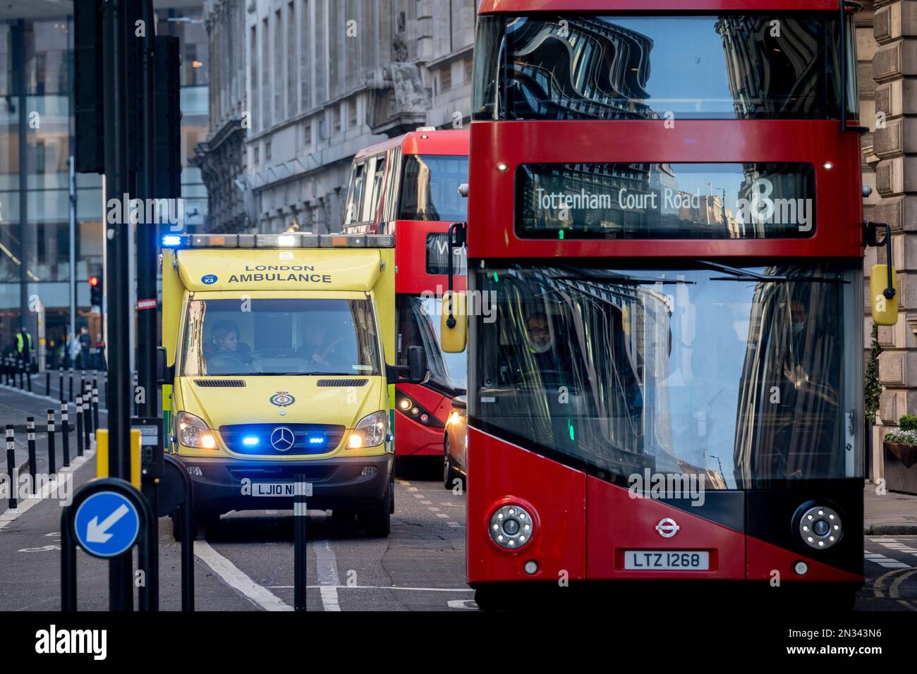An NHS ambulance on a 999 emergency response is blocked by buses at a ...