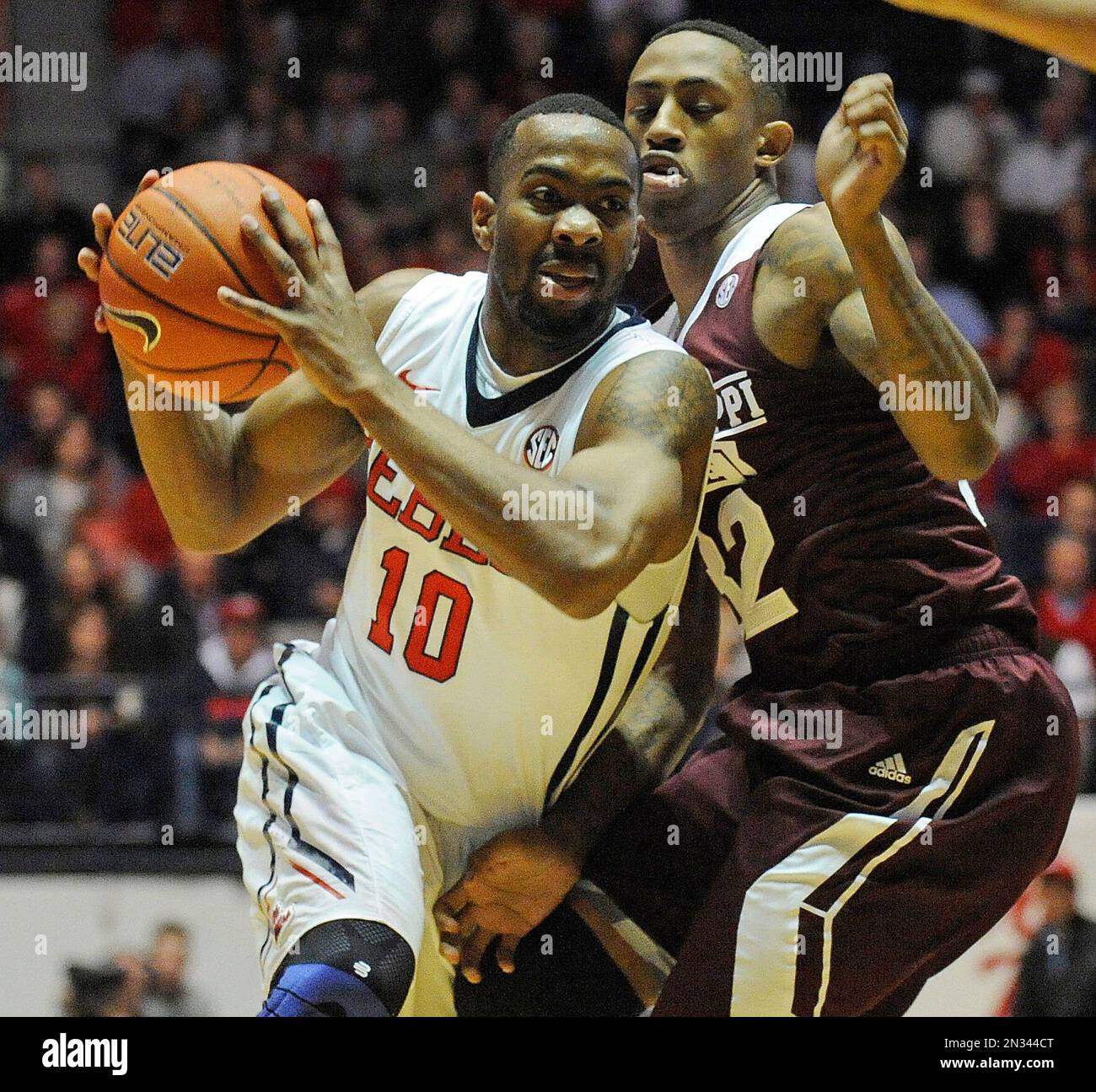Mississippi guard Ladarius White (10) drives past Mississippi State ...