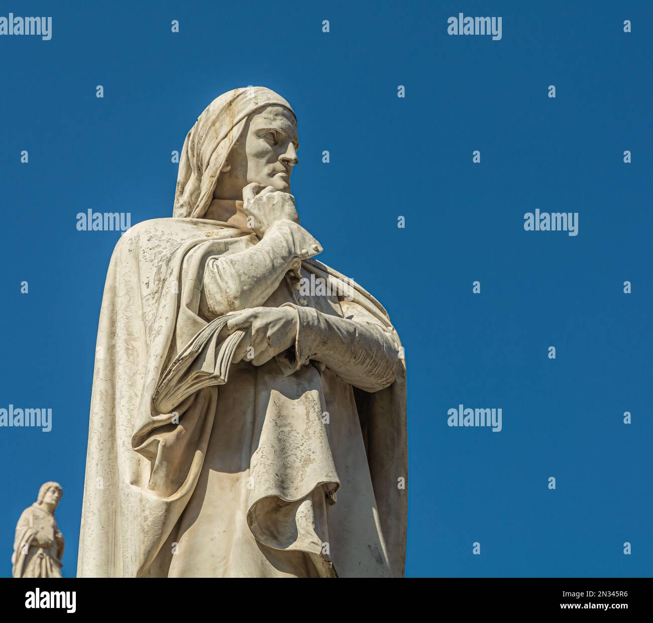 marble statue of Dante Alighieri, the major Italian poet in Piazza dei ...
