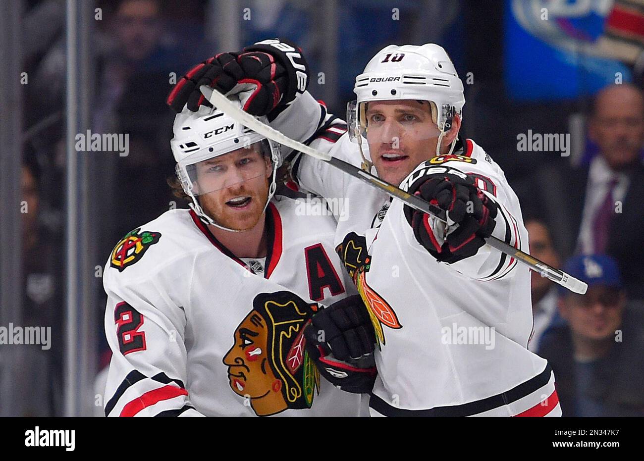 Chicago Blackhawks left wing Patrick Sharp, right, celebrates his goal ...