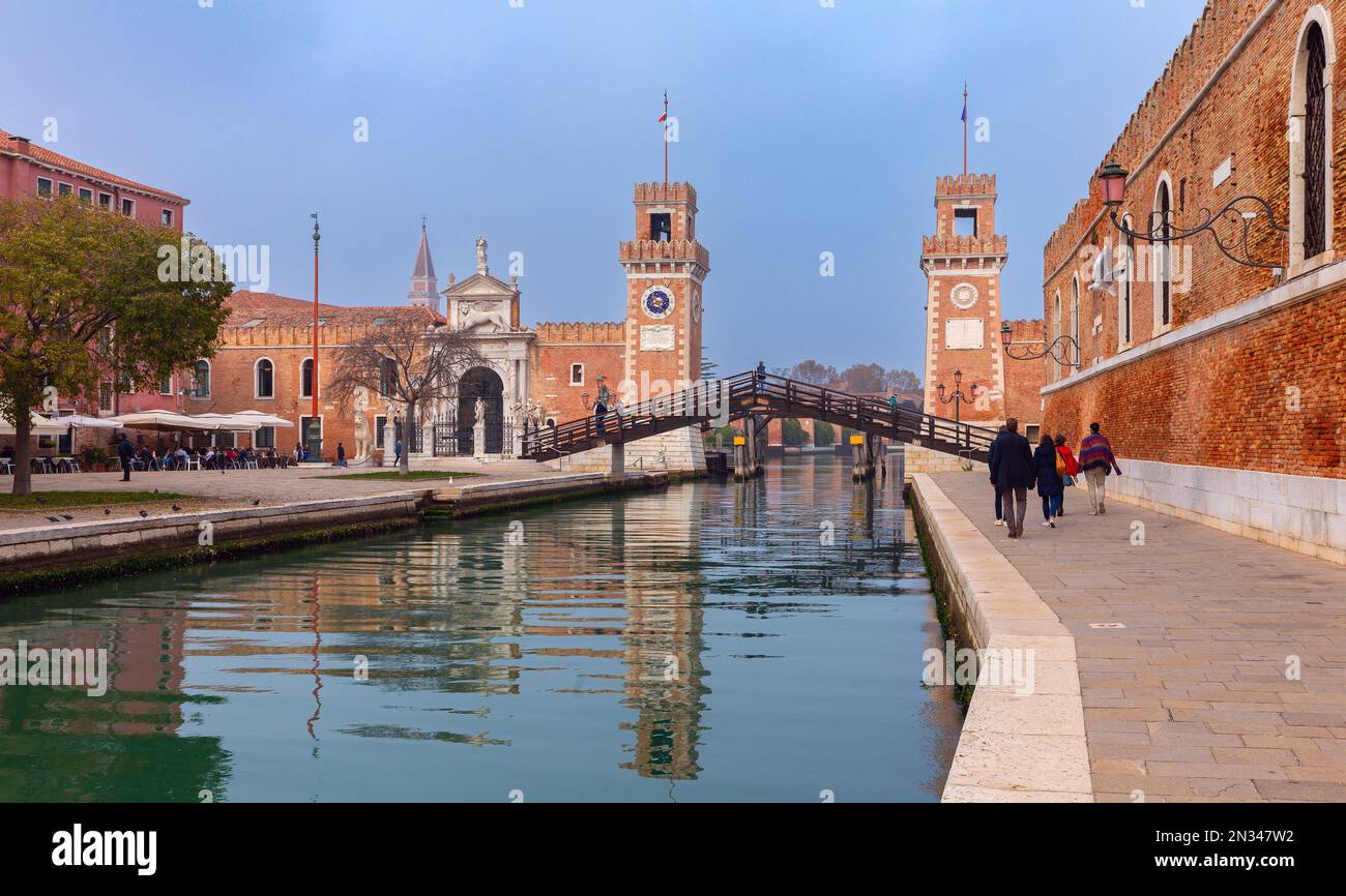 View of the old medieval armory towers and the bridge over the canal ...