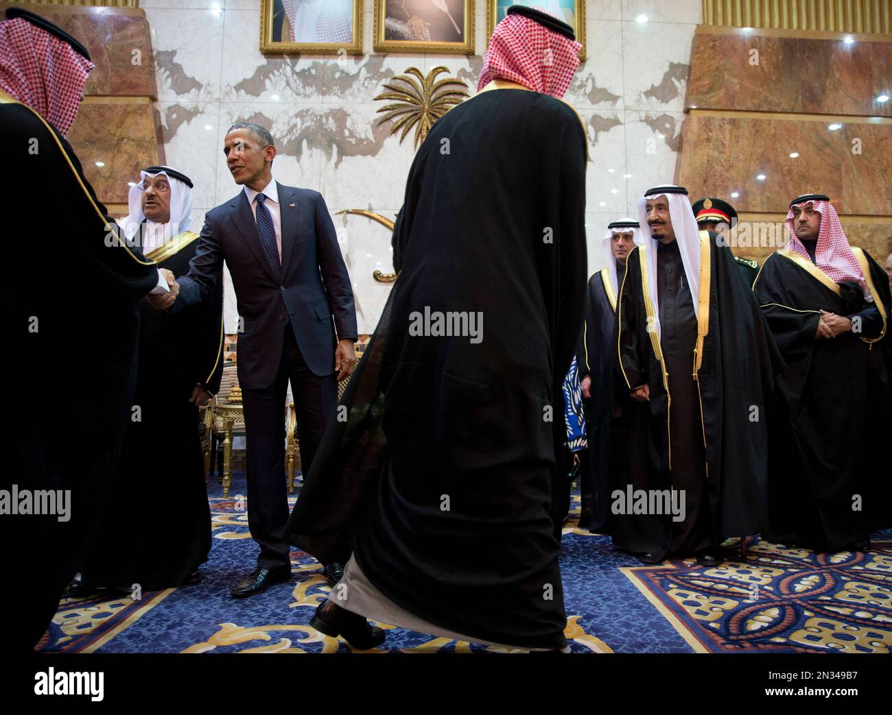President Barack Obama participates in a receiving line with the new ...